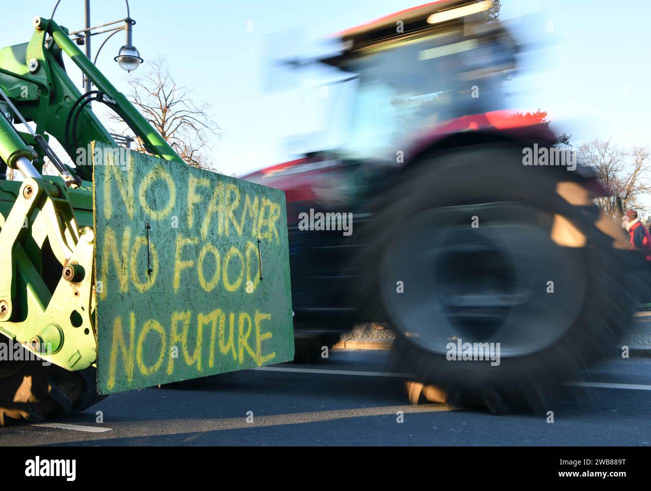 Berlin, Germany. 8th Jan, 2024. A tractor runs during a protest near ...
