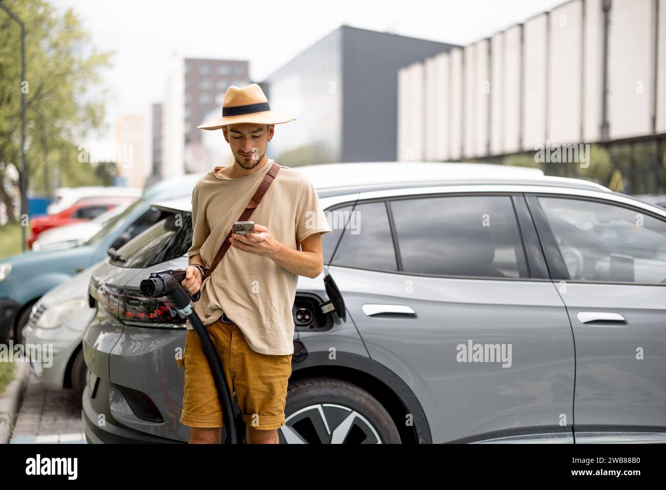 Man electric car hi-res stock photography and images - Alamy