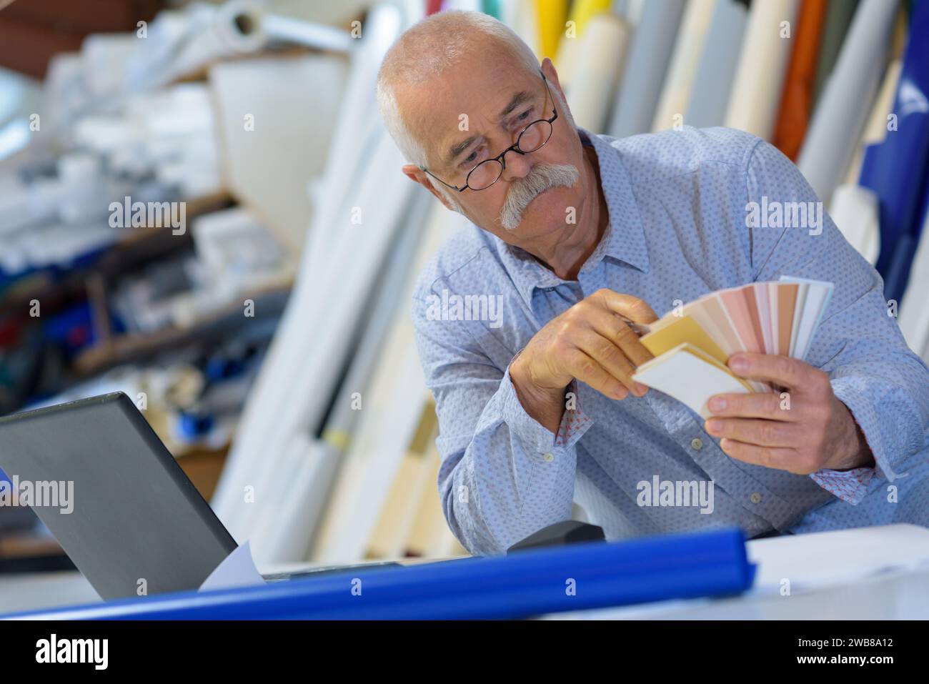design studio architect creative holding swatches Stock Photo - Alamy