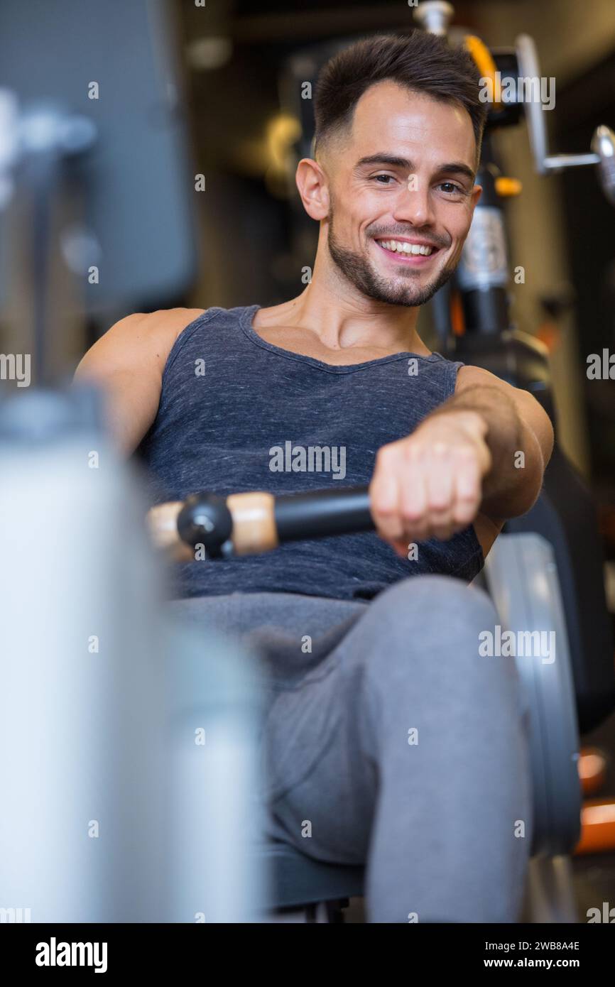 Man on rower machine hi-res stock photography and images - Alamy