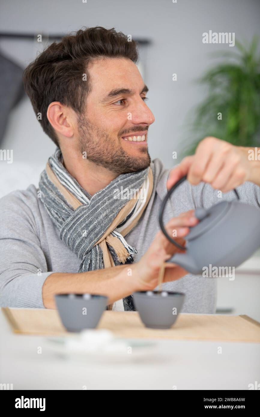 Hand pours glass milk from hi-res stock photography and images - Alamy