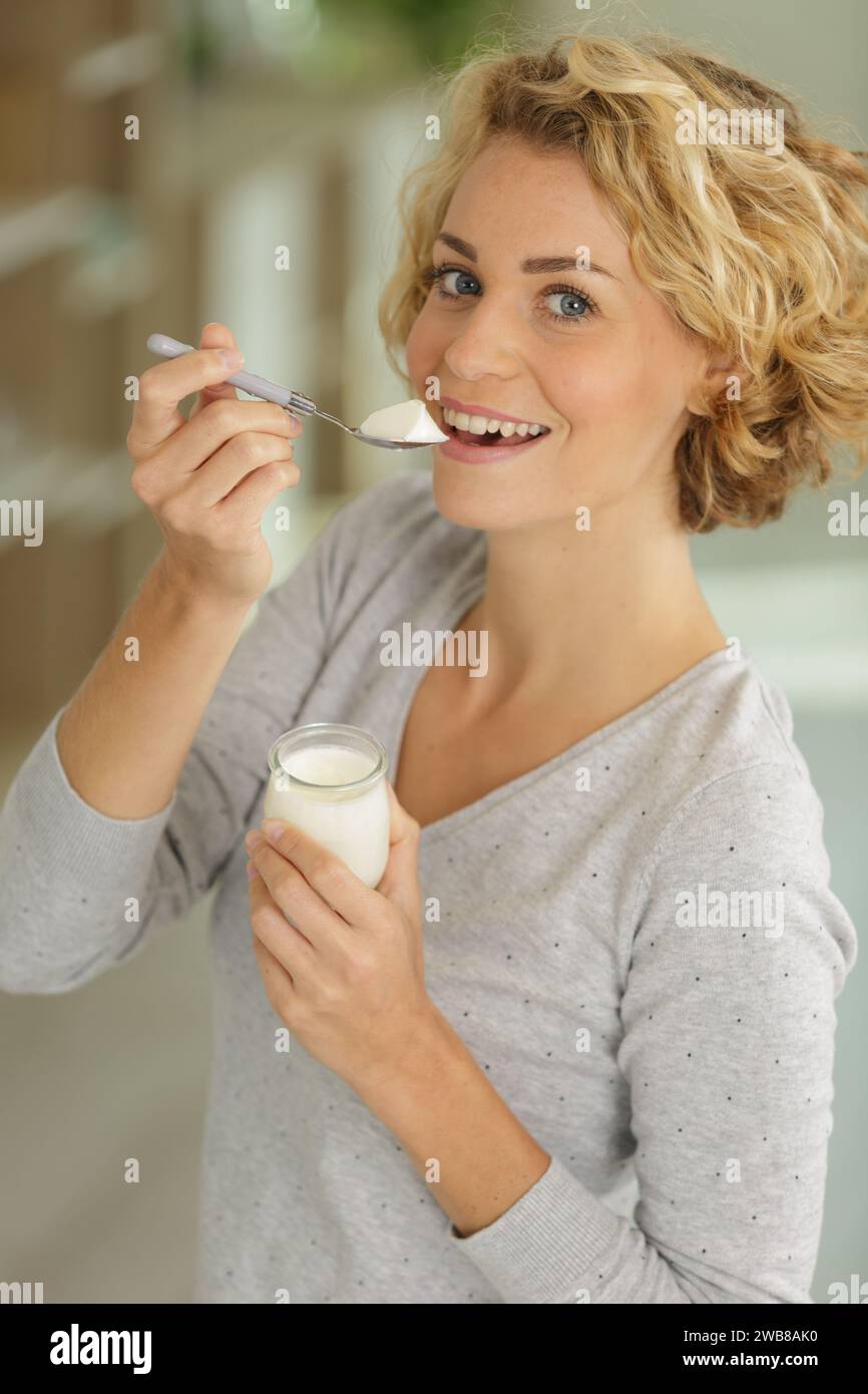 Young lady mouth open eat hi-res stock photography and images - Alamy