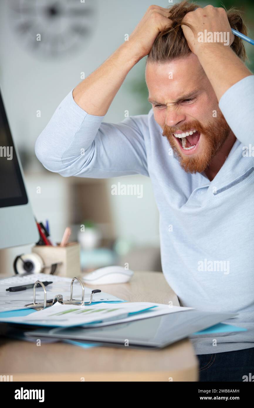 Angry businessman workaholic working hi-res stock photography and ...