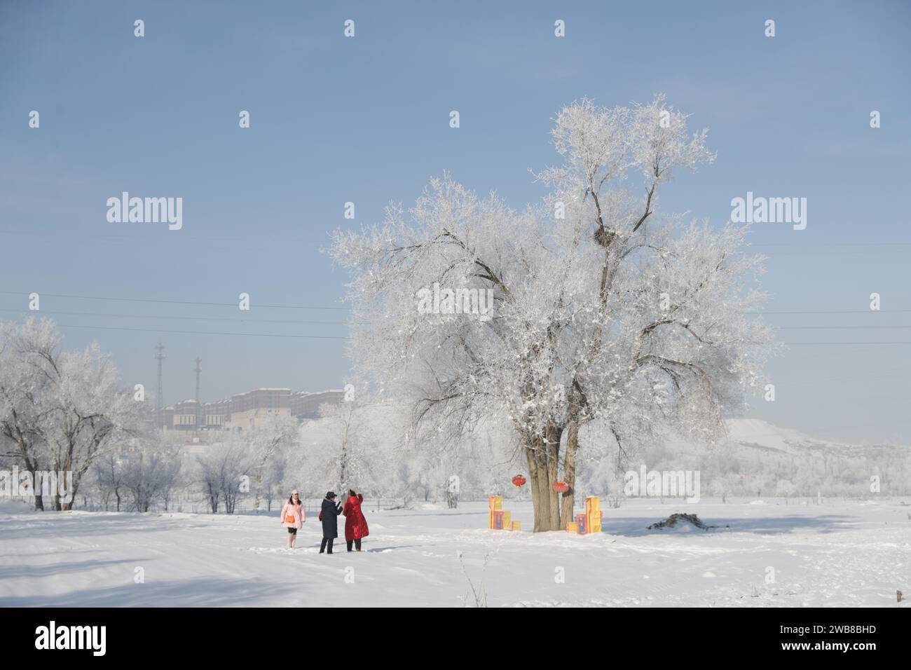 A fairy-tale snow village draws tourists in Urumqi City, northwest ...