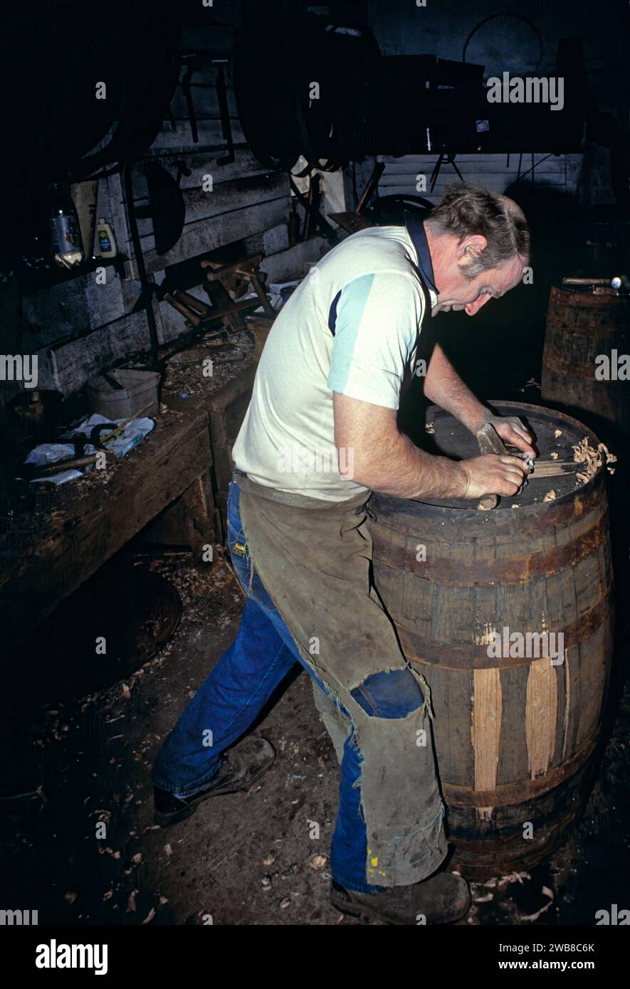 Cooperage in Scotland a cooper restoring the top of the cask or barrel ...