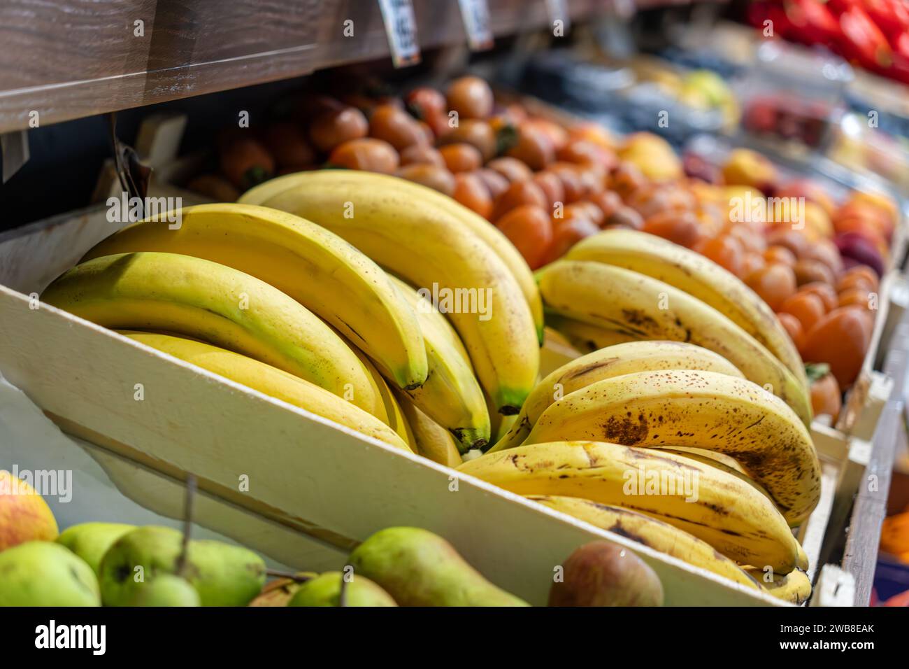 bananas in the fruit section, close-up Stock Photo - Alamy