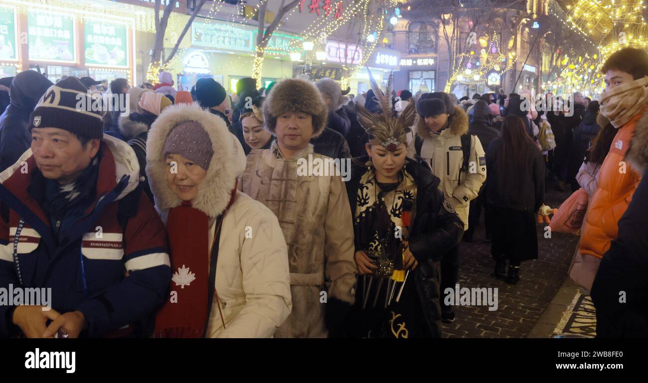 People from Hezhen ethnic group perform and send special local product ...