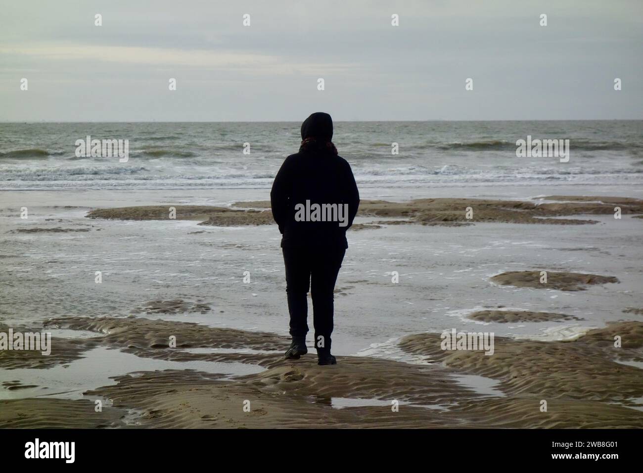 Solitary person on a beach hi-res stock photography and images - Alamy