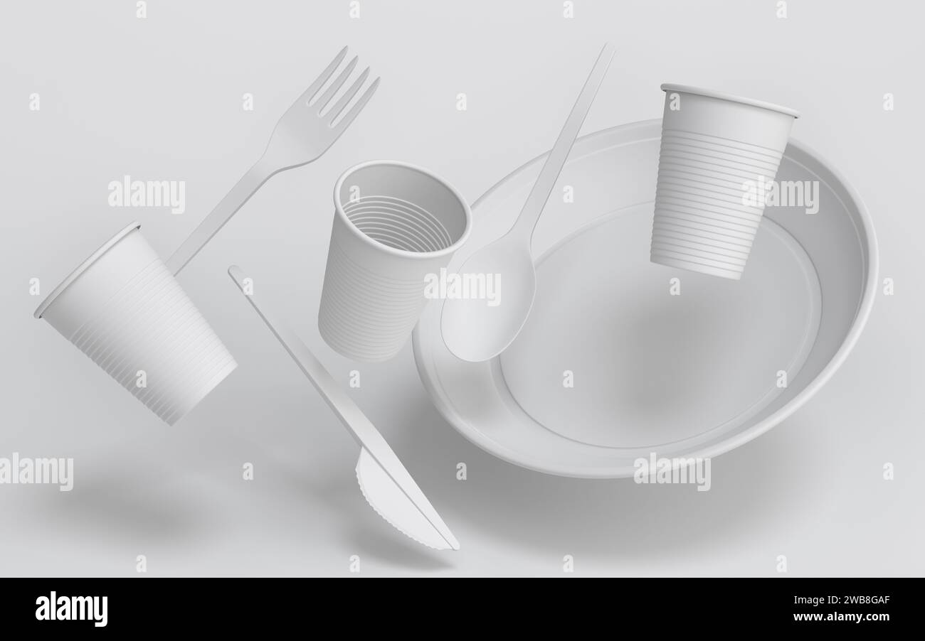 Set of disposable utensils like plate, folk, spoon,knife and cup on ...