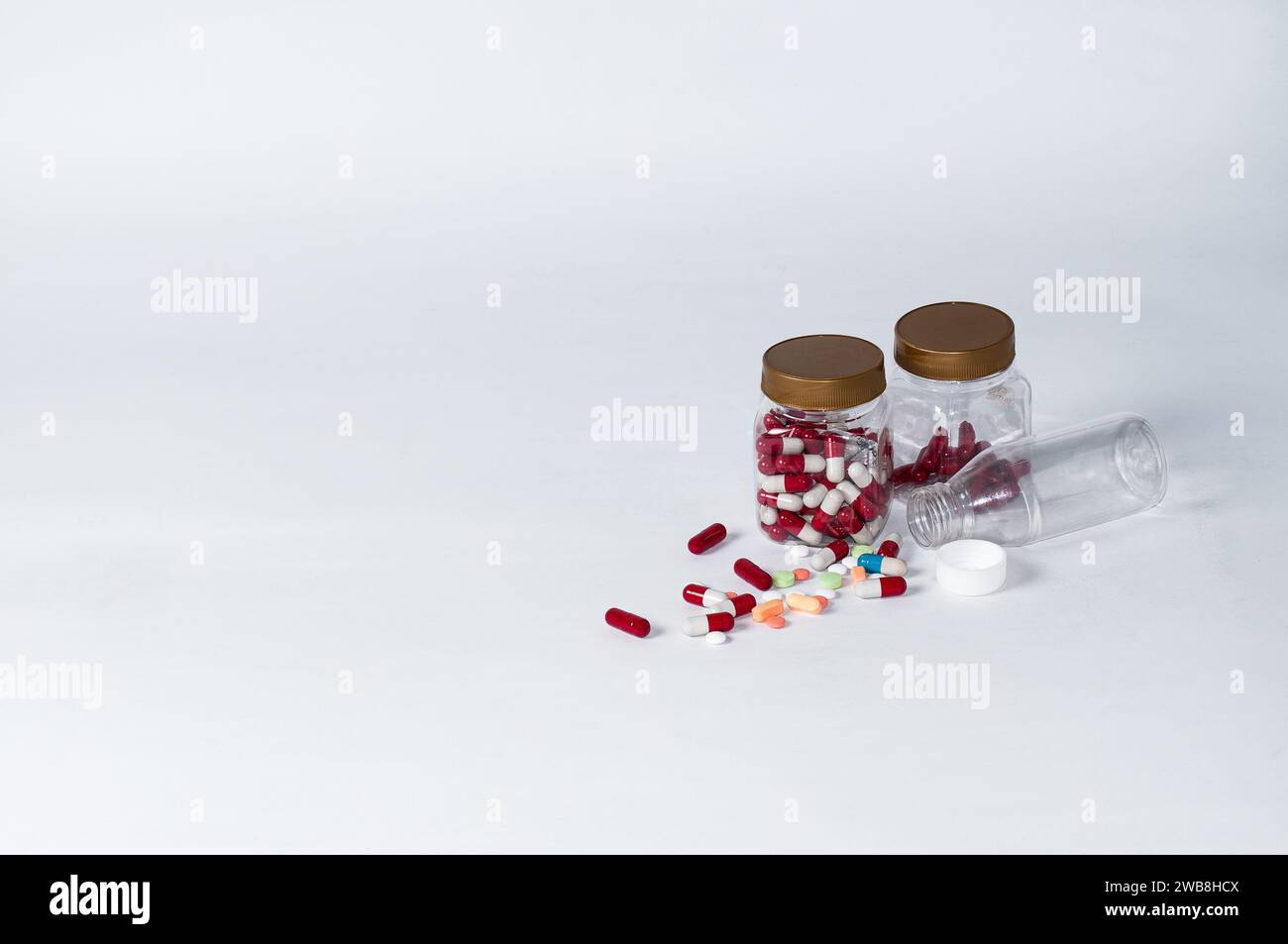photos of medicines scattered outside their packaging in various types ...