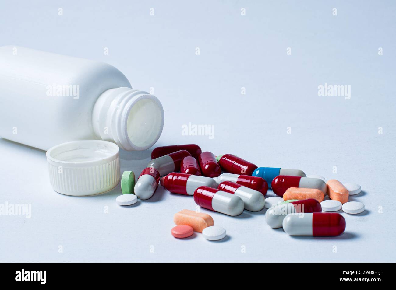 photos of medicines scattered outside their packaging in various types ...