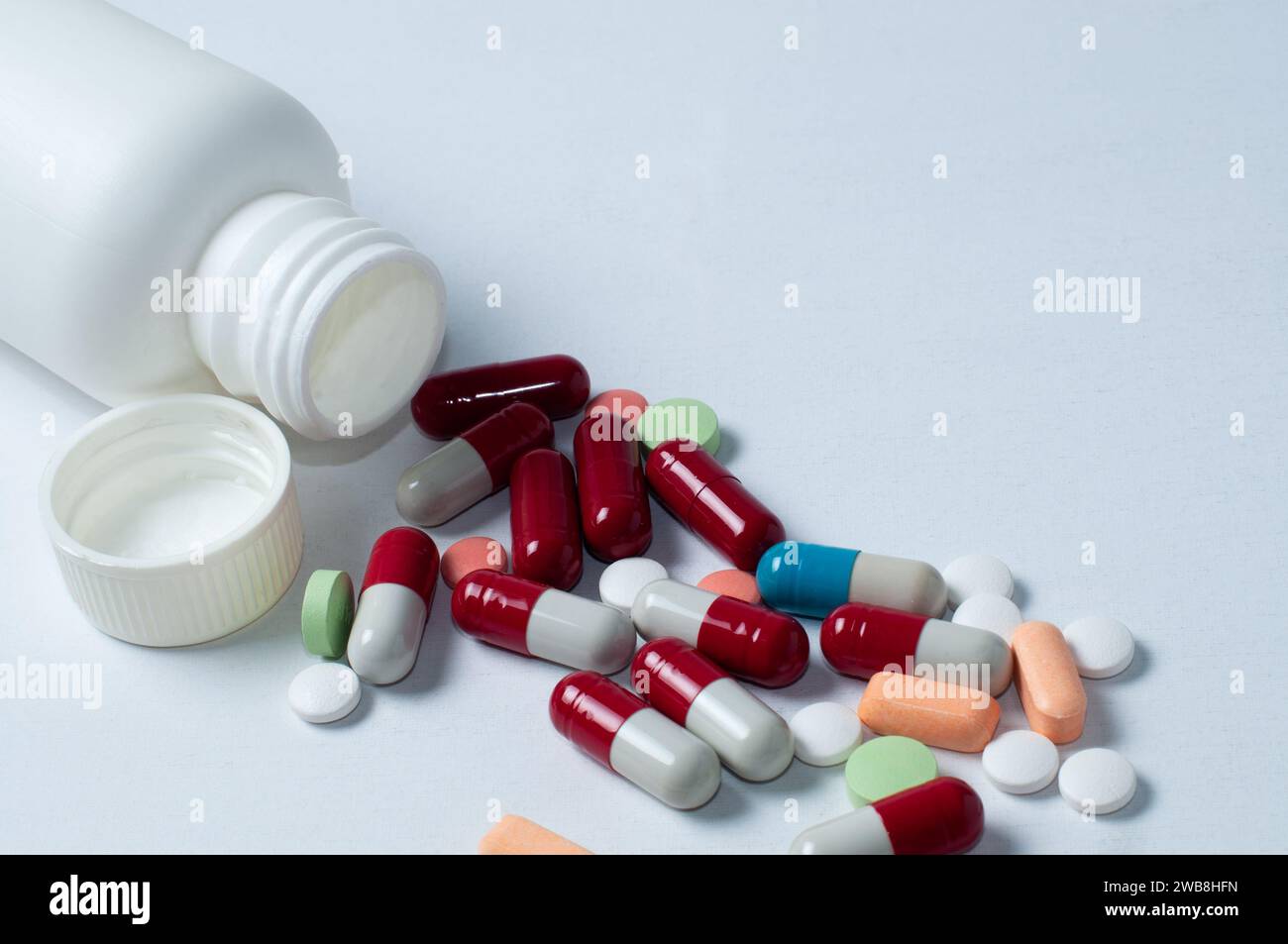 photos of medicines scattered outside their packaging in various types ...