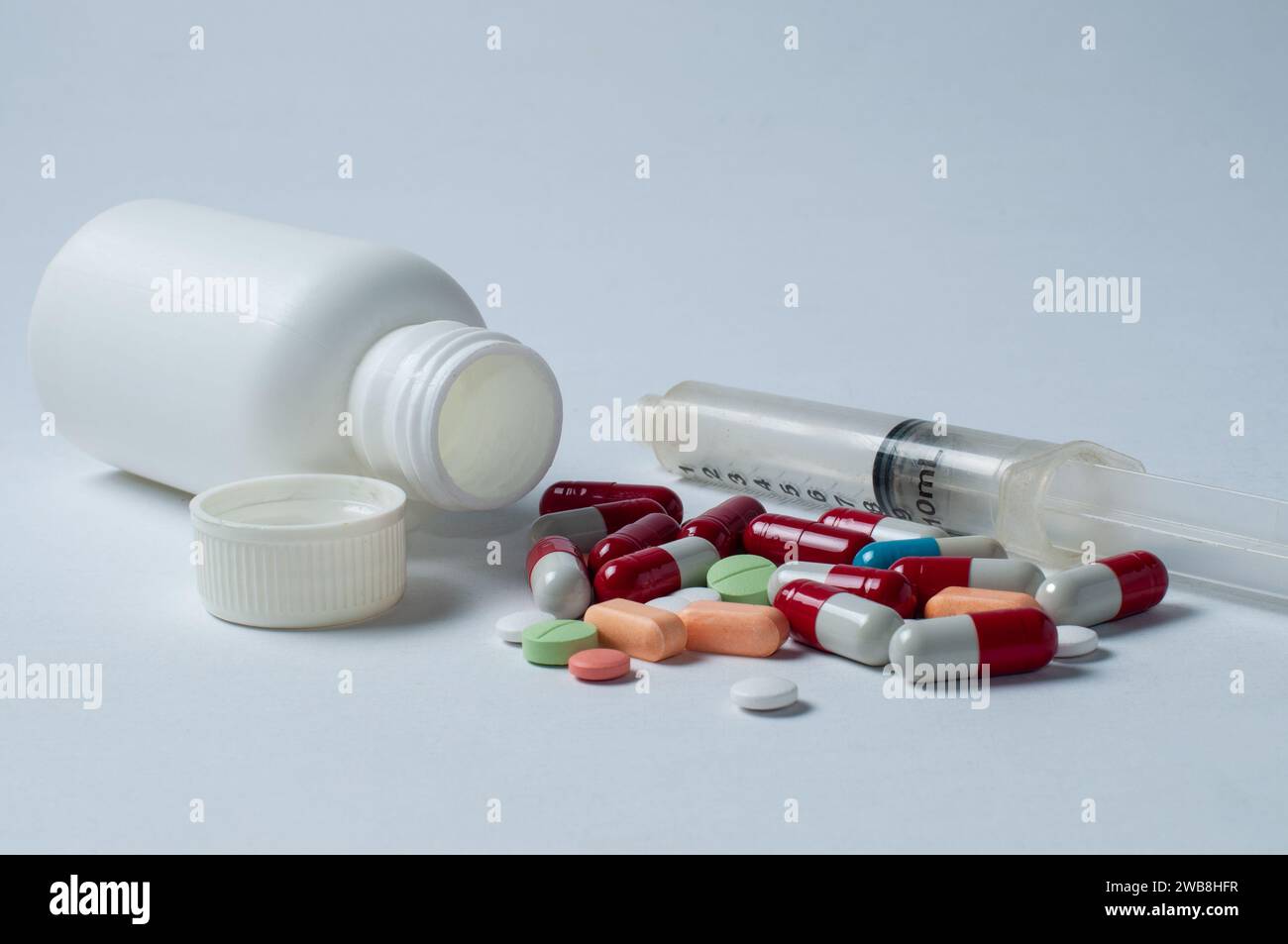 photos of medicines scattered outside their packaging in various types ...