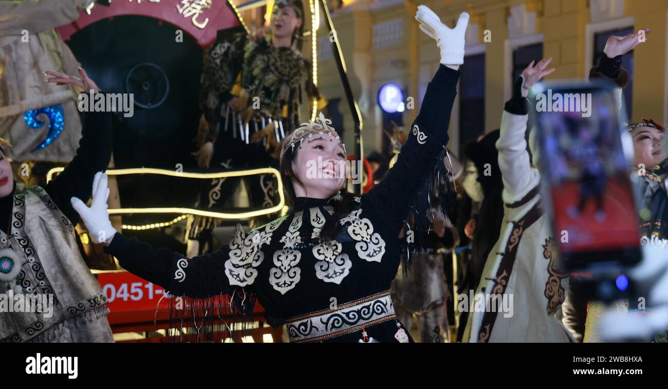 People from Hezhen ethnic group perform and send special local product ...