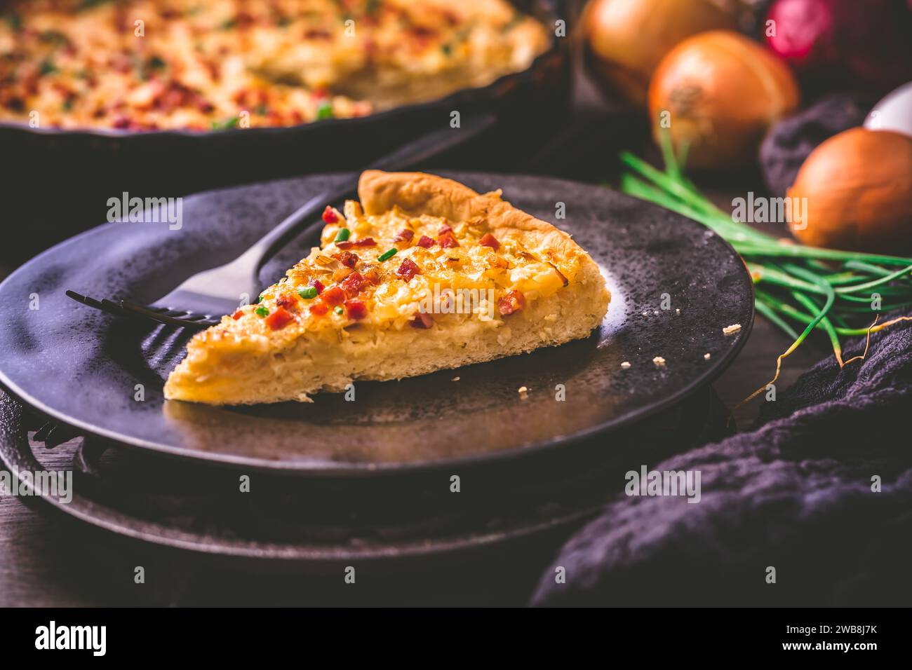 Homemade onion cake with bacon, traditional German savory onion pie ...