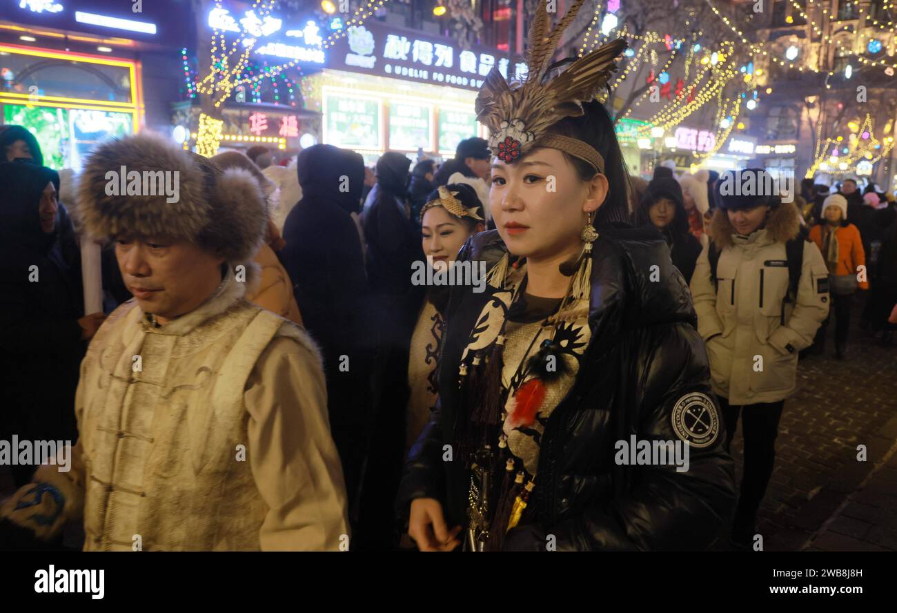 People from Hezhen ethnic group perform and send special local product ...