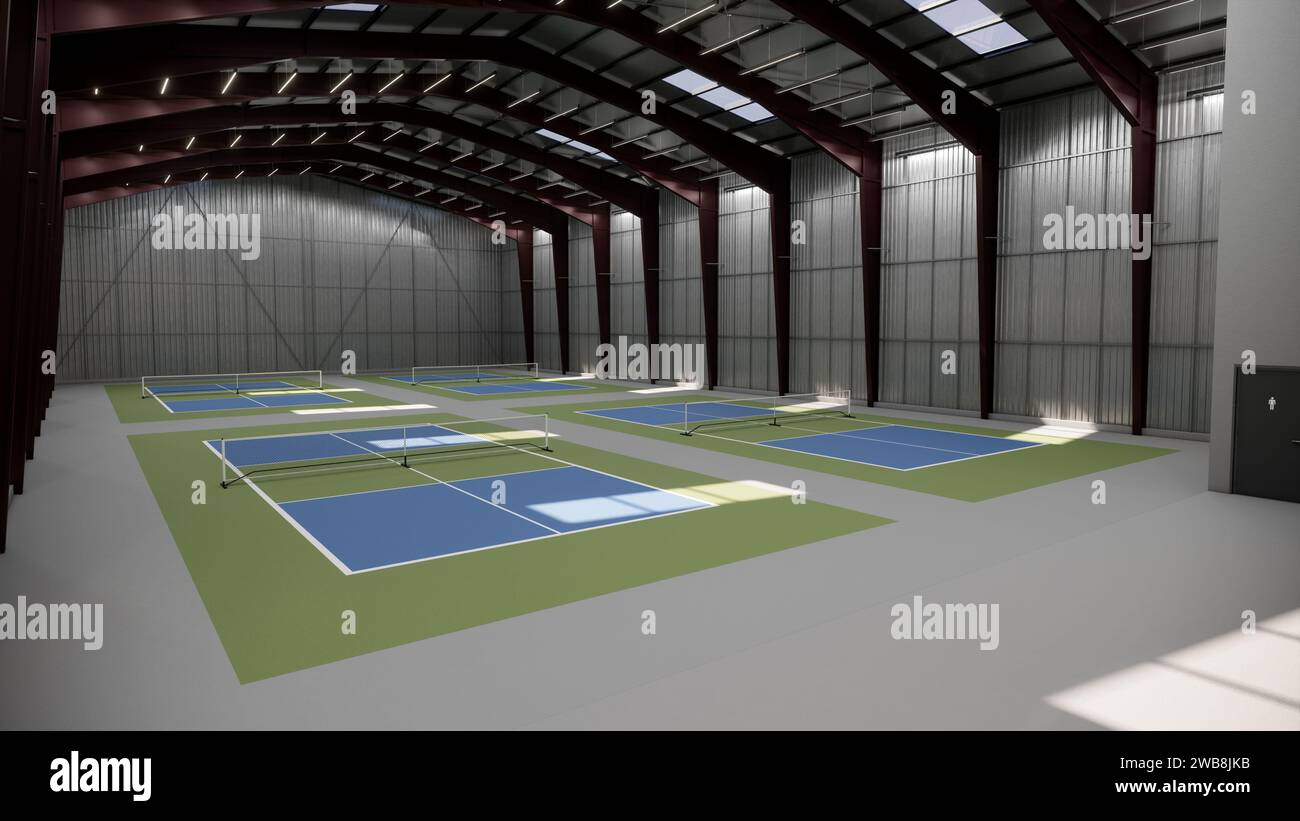 indoor pickleball court inside the warehouse building with green and ...