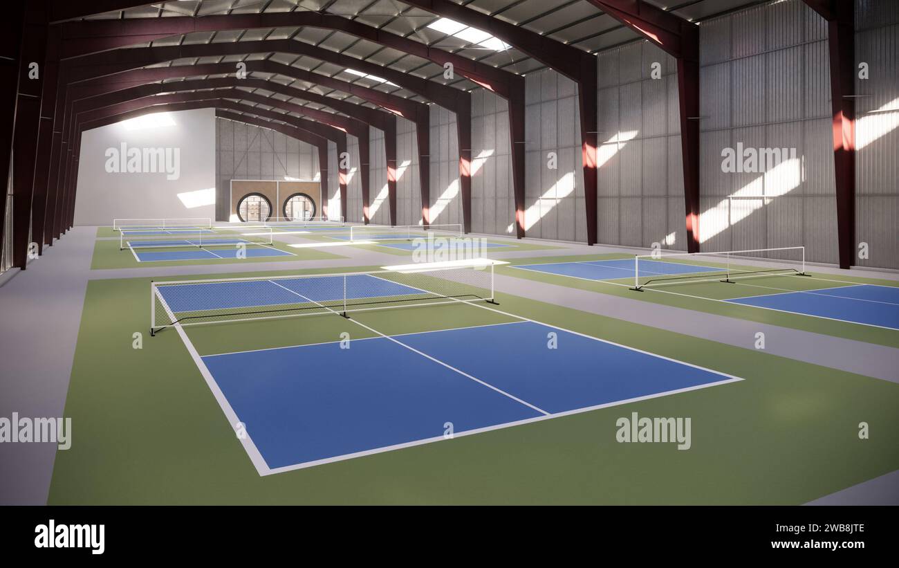 indoor pickleball court inside the warehouse building with green and ...