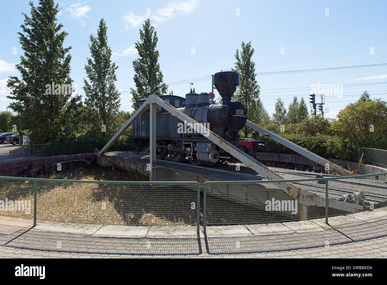 Old steam locomotive on rail turn table Stock Photo - Alamy