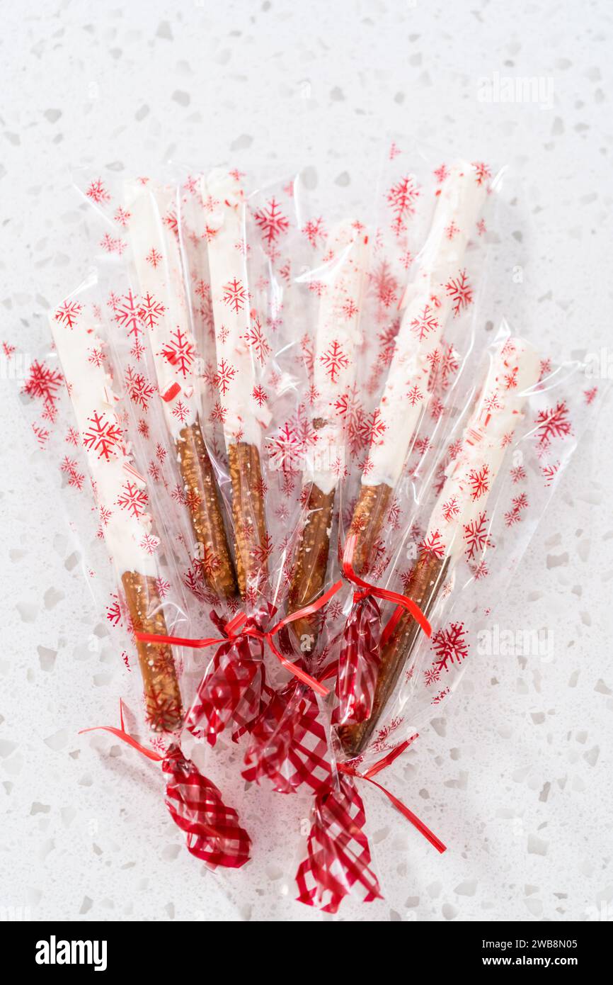 Candy cane chocolate covered pretzel rods Stock Photo - Alamy