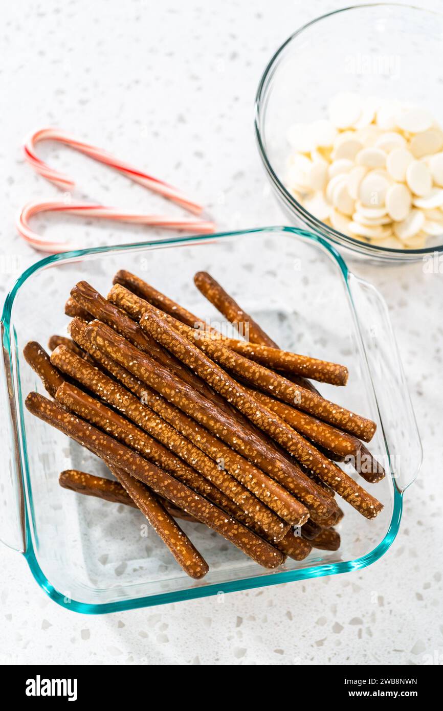 Candy cane chocolate covered pretzel rods Stock Photo - Alamy