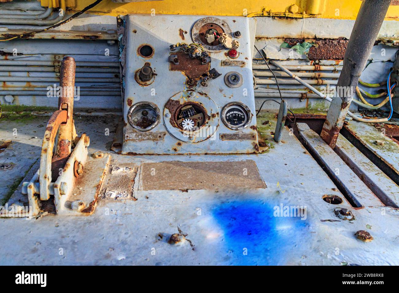 Small control panel and levers inside a very old dismantled railway ...