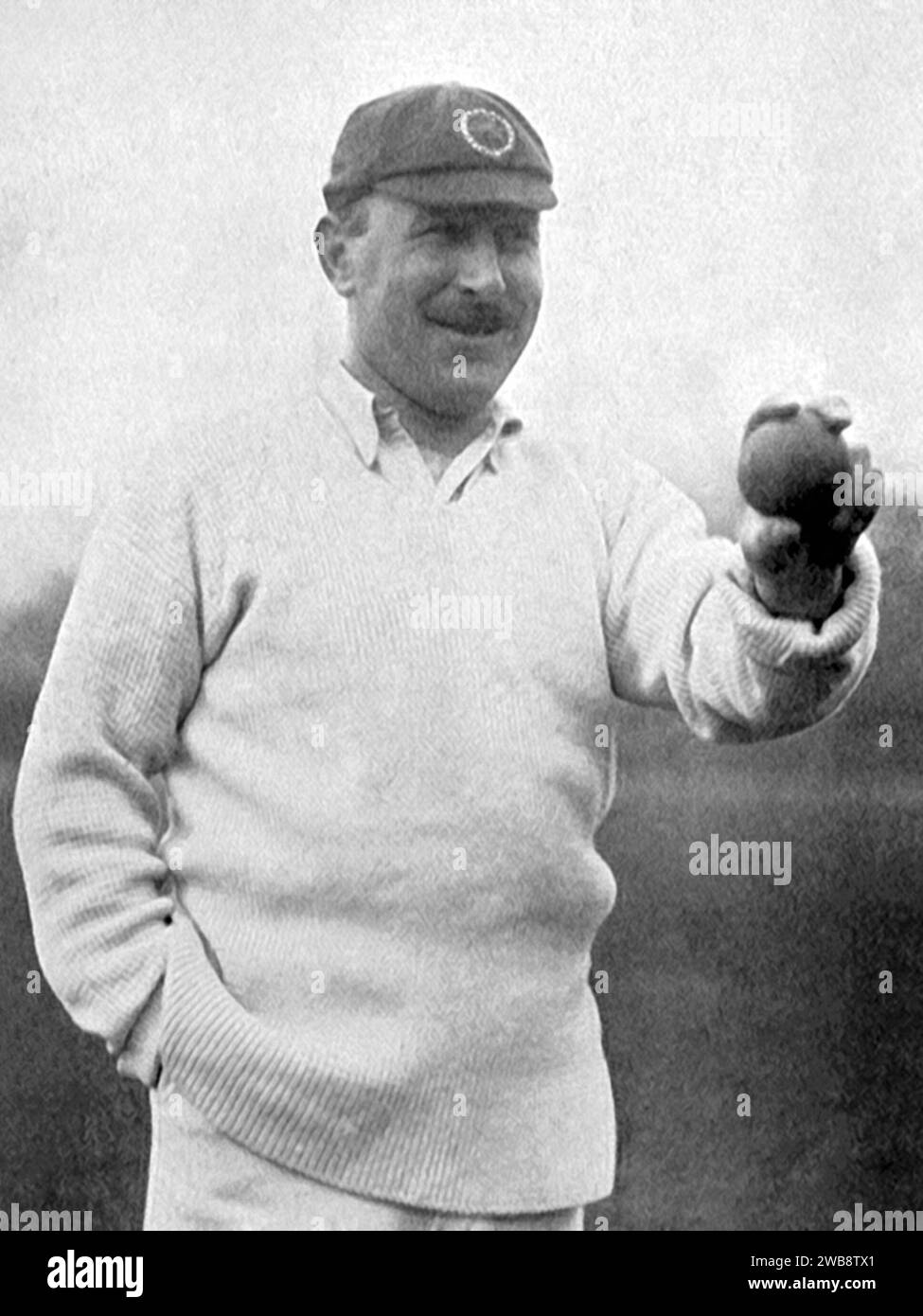 George Hirst demonstrating his grip of a cricket ball, photographed by ...