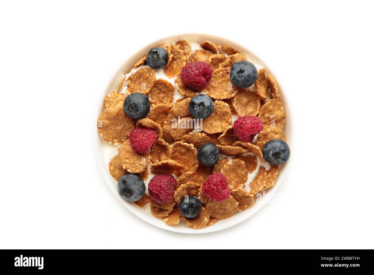 Bowl of corn flakes and fresh berries isolated on white background. Top ...