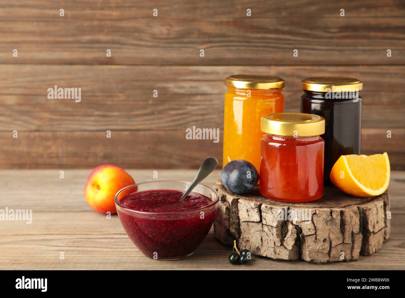 Homemade fruit jam in the jar on grey background Stock Photo - Alamy