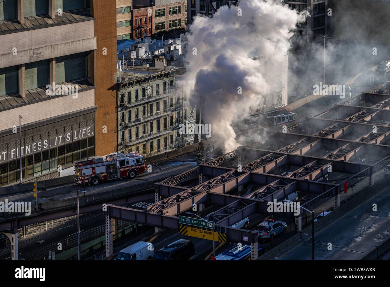 An aerial view of the Fire Department responding to a car fire on the ...