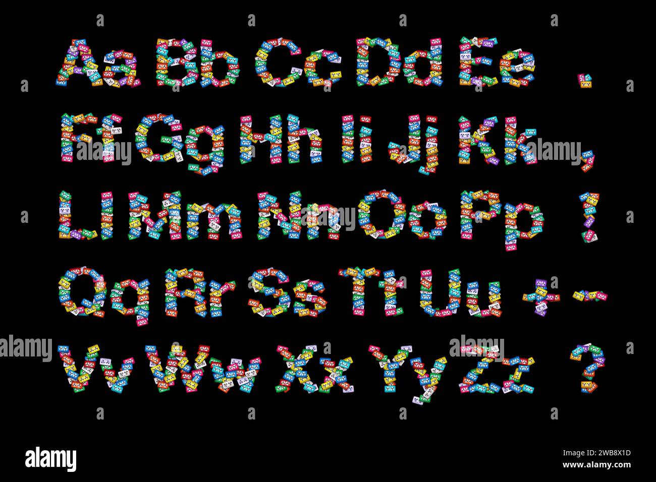 Top view of the English alphabet made of colorful audio cassettes with ...