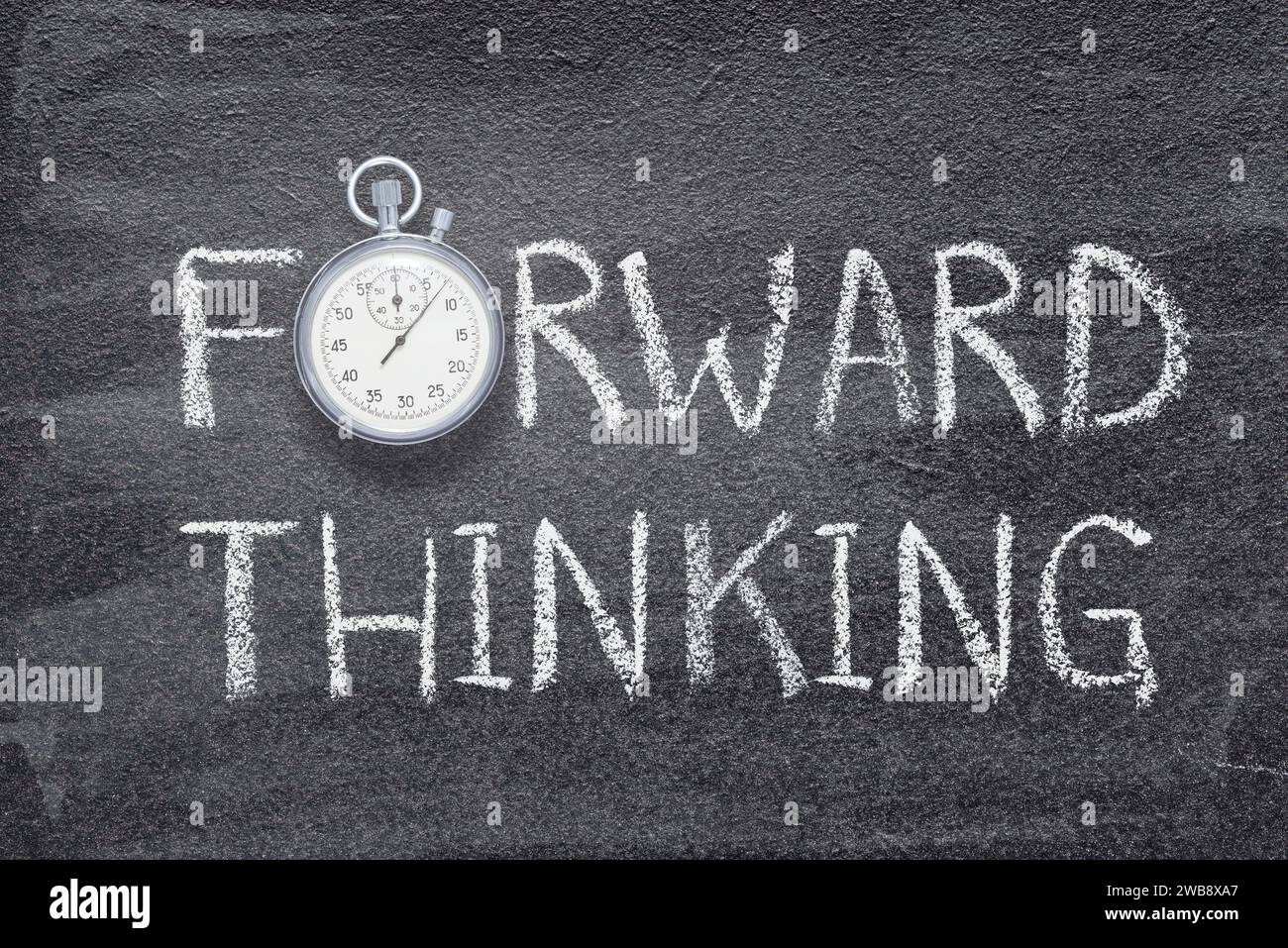 forward thinking phrase written on chalkboard with vintage precise ...