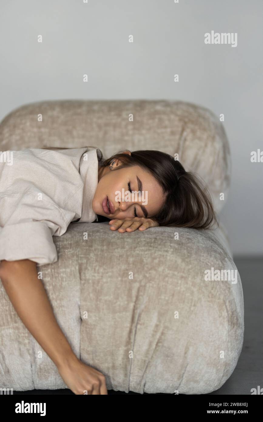 Woman taking nap hi-res stock photography and images - Alamy