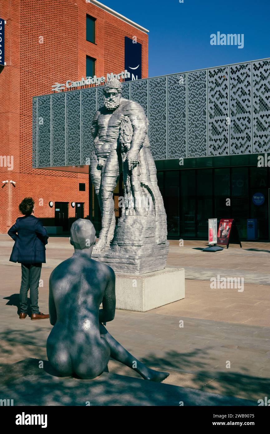 Person looking up at statue depicting Greco-Roman figures Hercules and ...