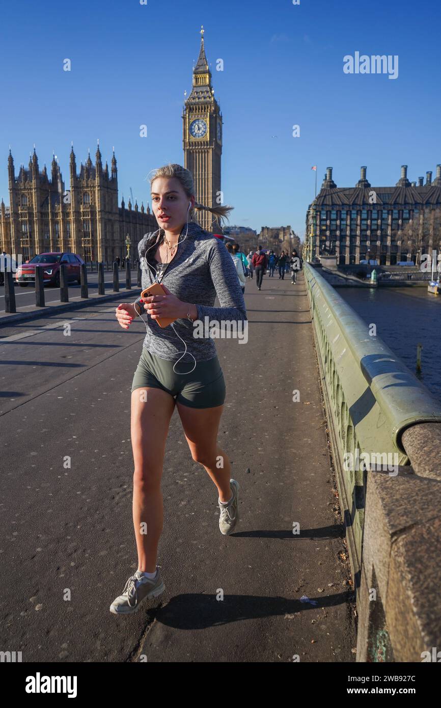 London, UK. 9 January 2024. A jogger running on a cold sunny morning on ...