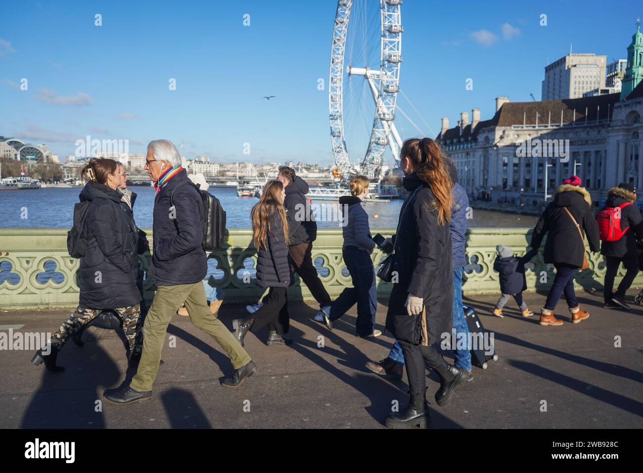 London, UK. 9 January 2024. Pedestrians walking on a cold sunny morning ...