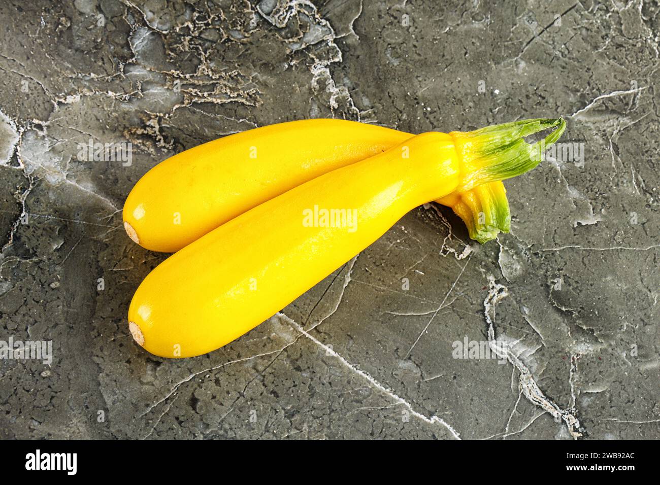 Two Yellow young zucchini for cooking Stock Photo - Alamy