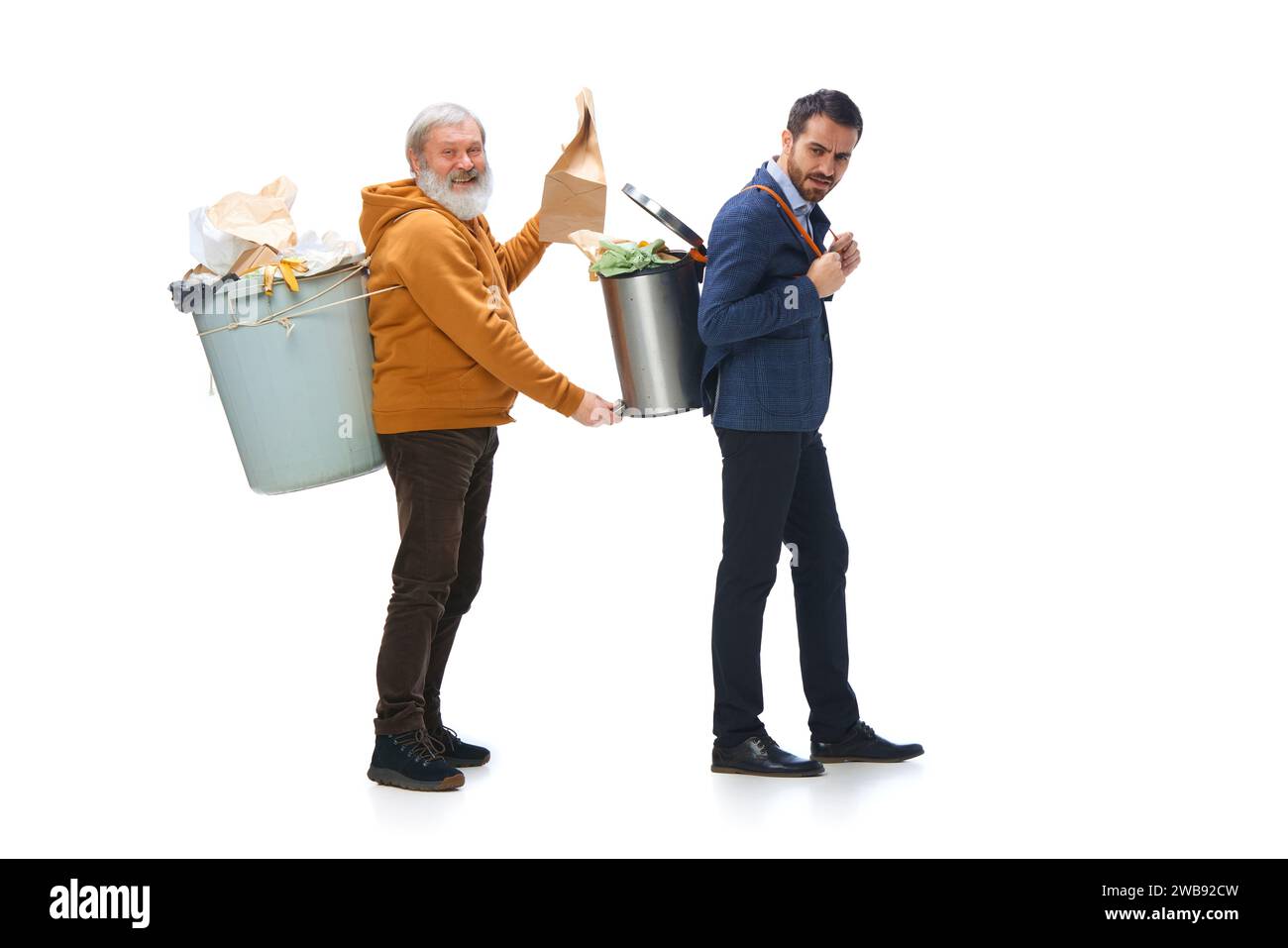 Senior and man in his 30s holding trash bins on backs, cleaning garbage ...