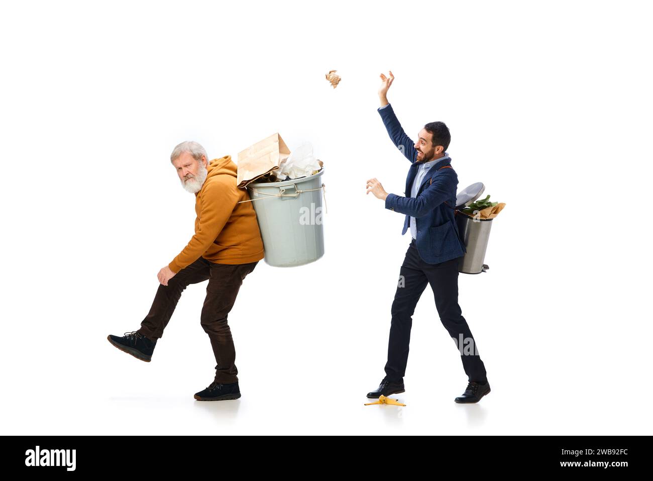 Sorting garbage types. Two men with trash bins on backs cleaning ...