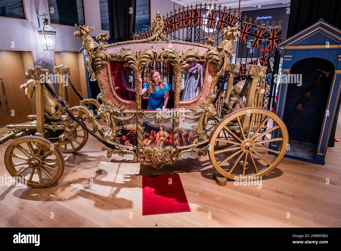 London, UK. 9th Jan, 2024. A reproduction of the Gold State Coach ...