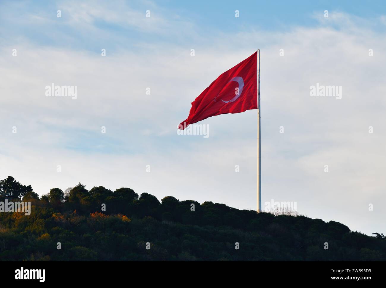 A huge flag of the Turkish Republic is installed on a high hill in the ...