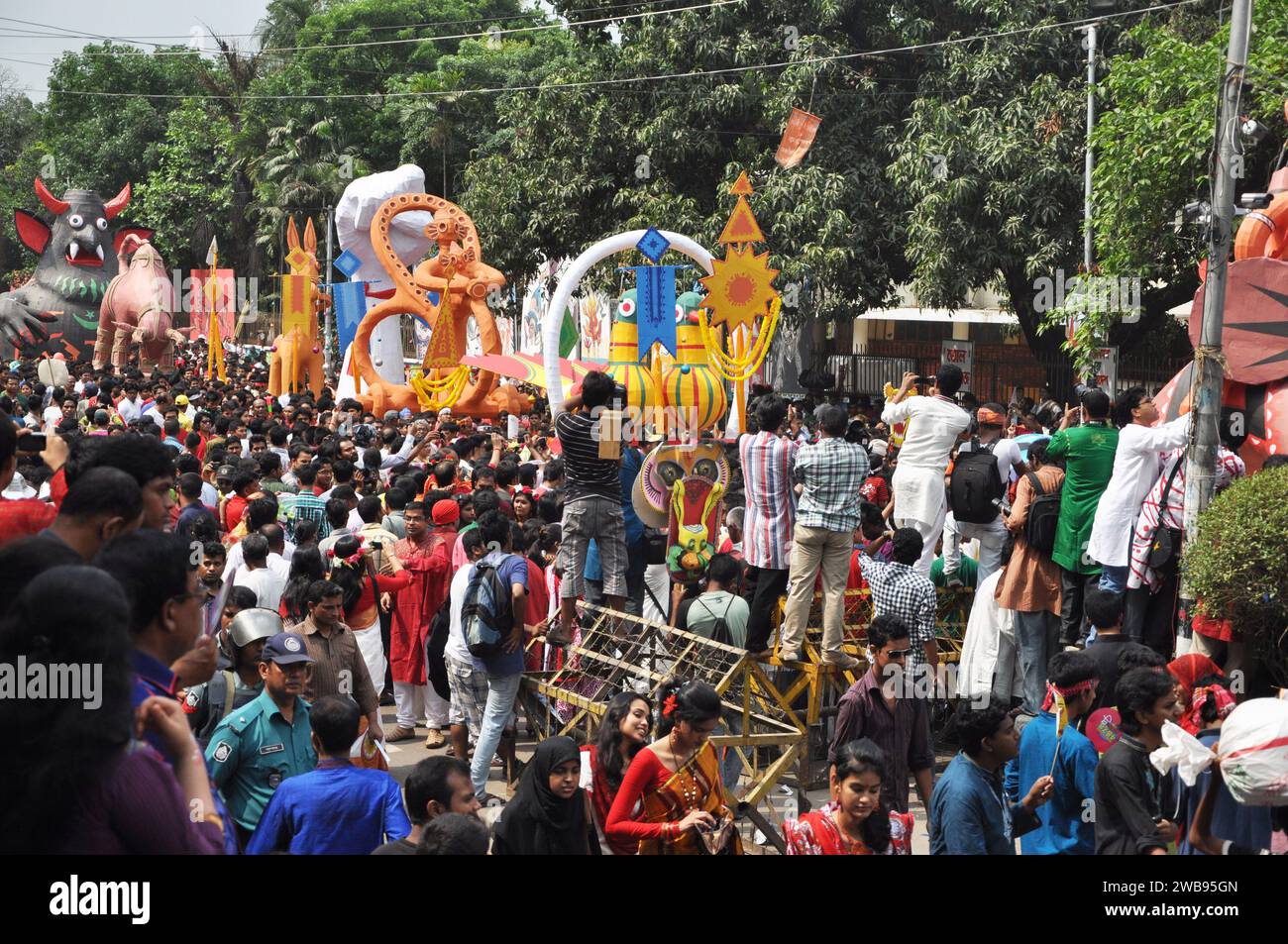 People celebrating in a colorful parade on the streets as a part of New ...