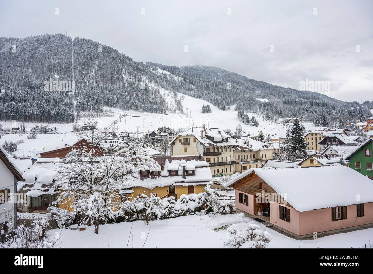 The tourist resort of Tarvisio after a heavy snowfall Stock Photo - Alamy
