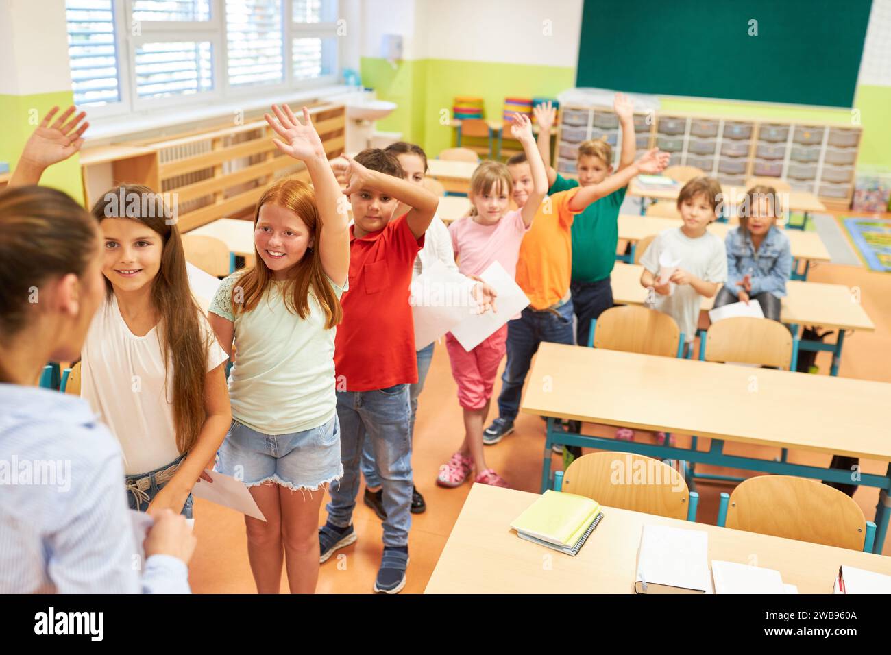 Happy diverse male teacher schoolchildren hi-res stock photography and ...