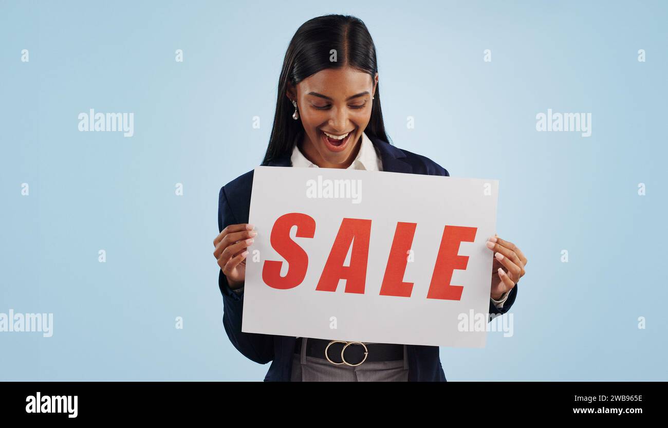 Happy woman, sale and sign for discount, advertising or deal against a ...