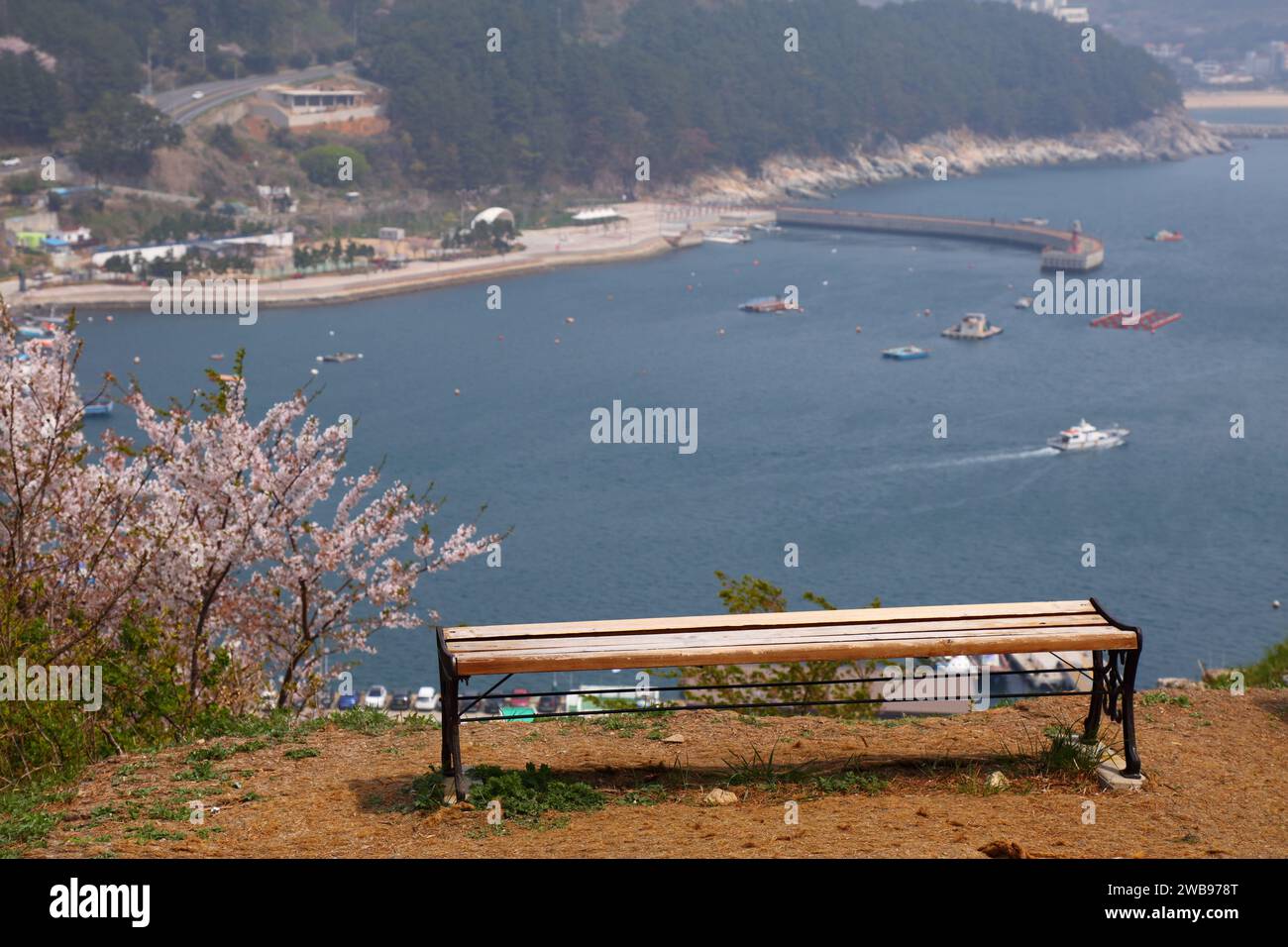 Geoje island in South Korea. Gujora Beach vacation town viewpoint bench ...