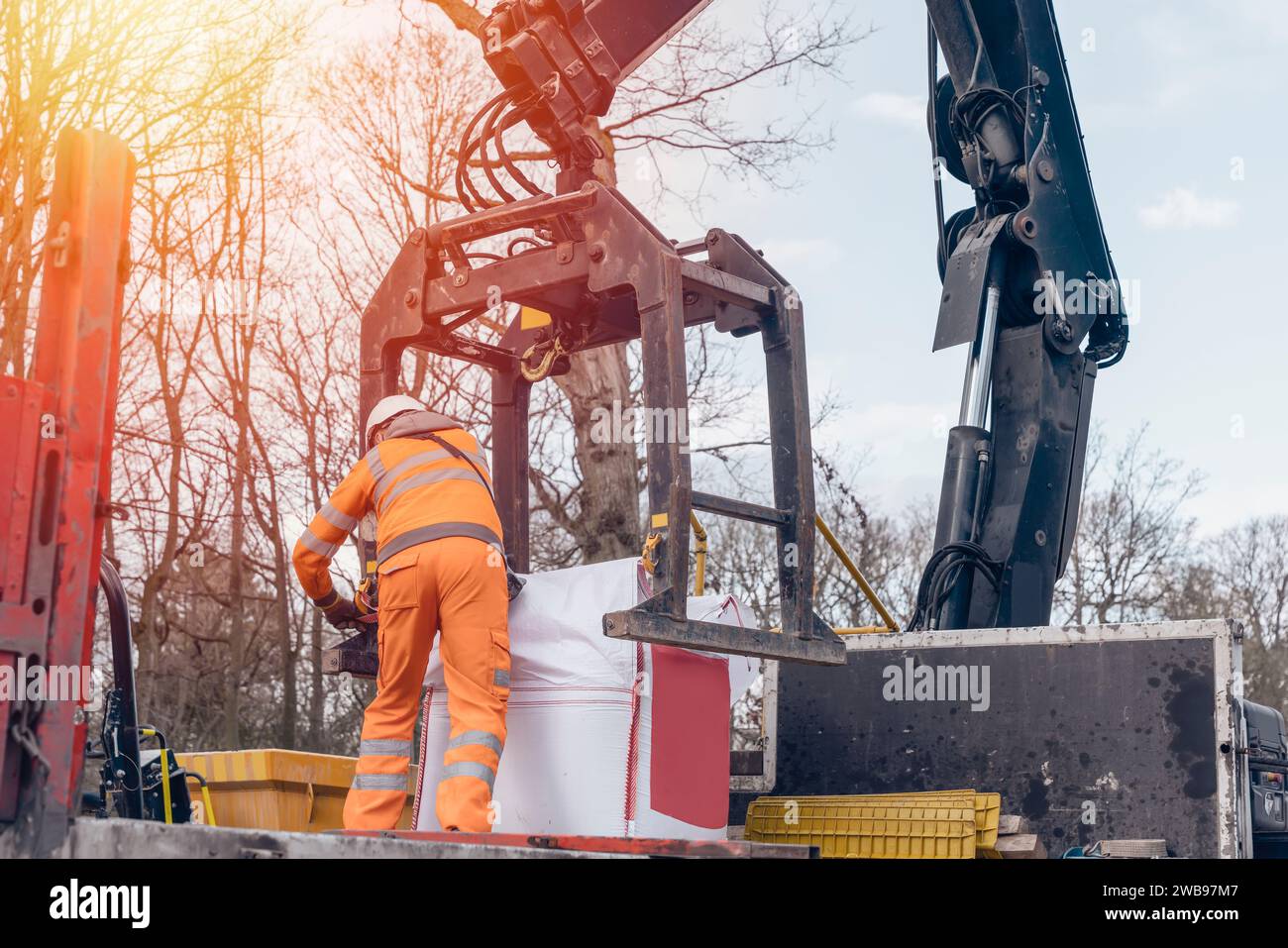 Dropside flatbed HIAB crane lorry with brick grab attachment deliver ...
