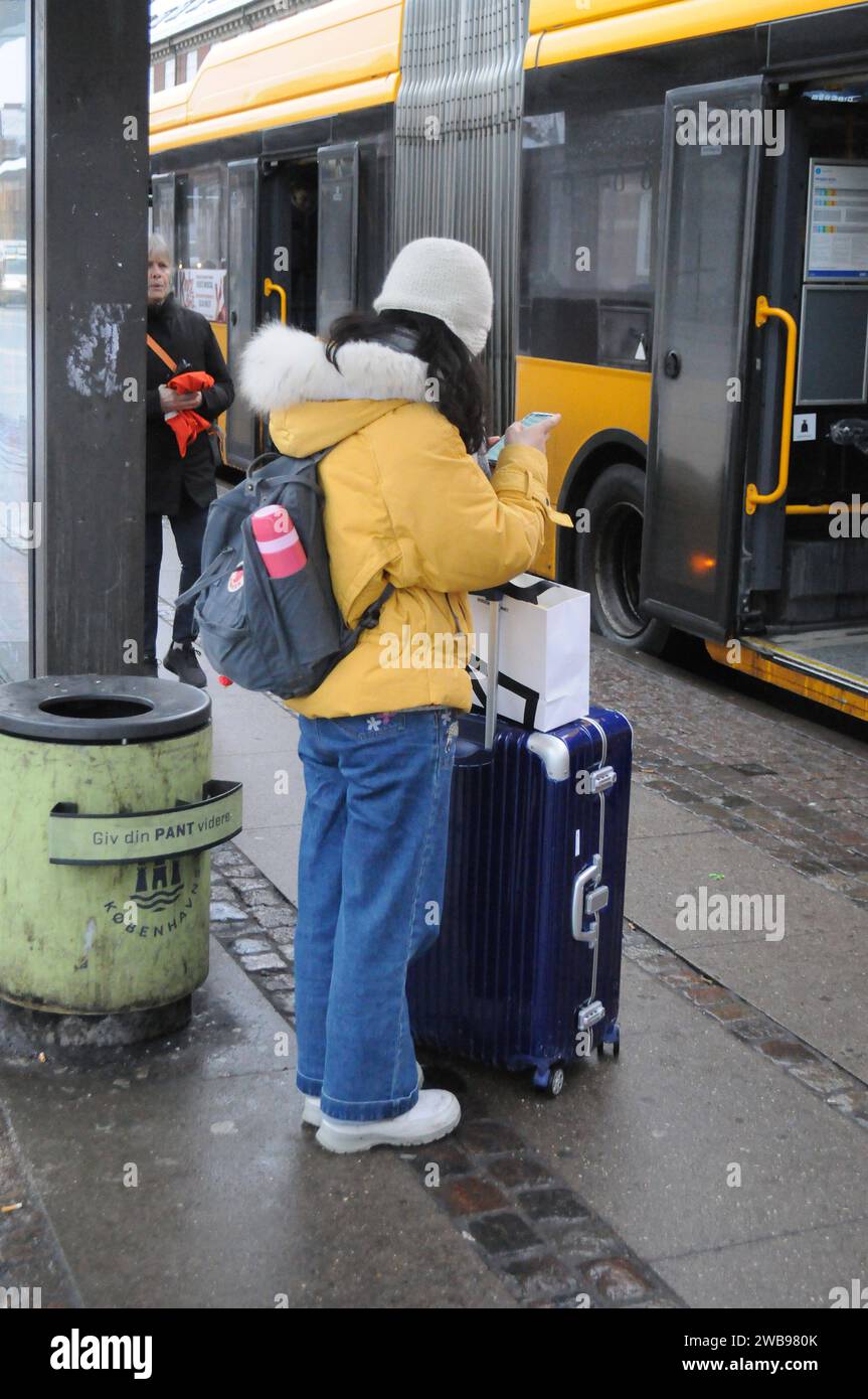 Copenhagen, Denmark /09 January 2024/. Traveller ues danish public bus ...