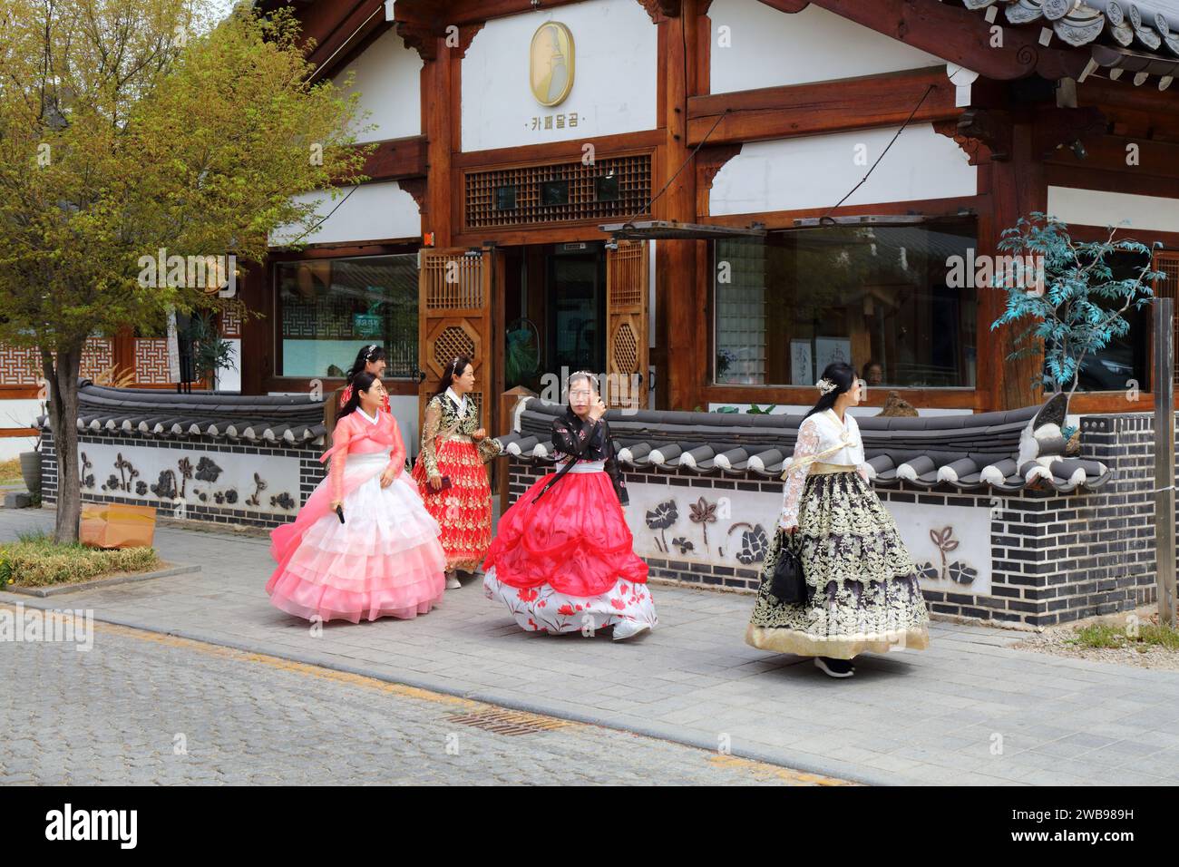 JEONJU, SOUTH KOREA - APRIL 4, 2023: Tourists in traditional hanbok ...
