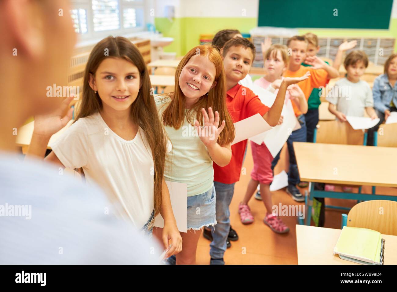 Teacher waving hi-res stock photography and images - Alamy